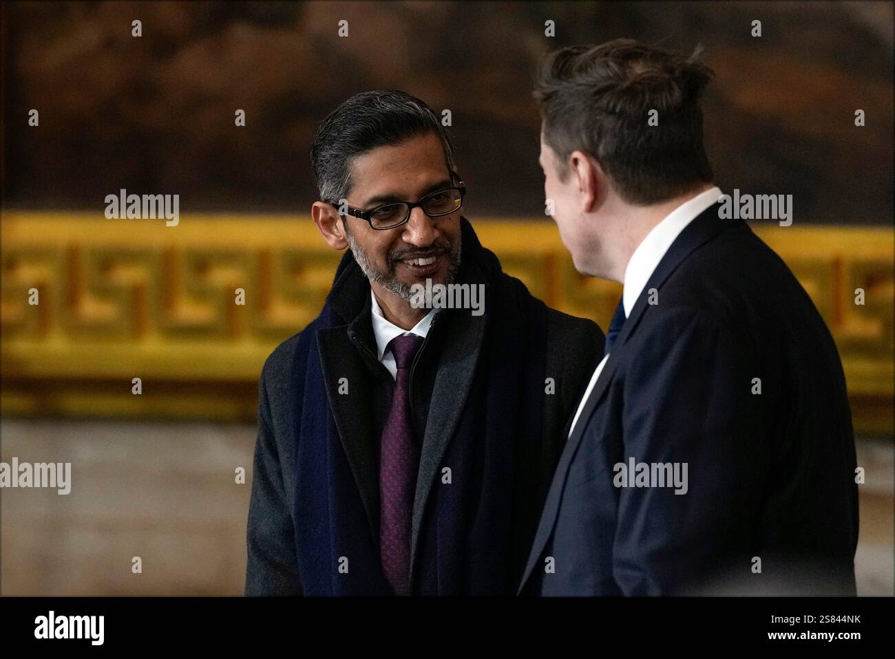 Google CEO Sundar Pichai talks with Elon Musk before the 60th ...