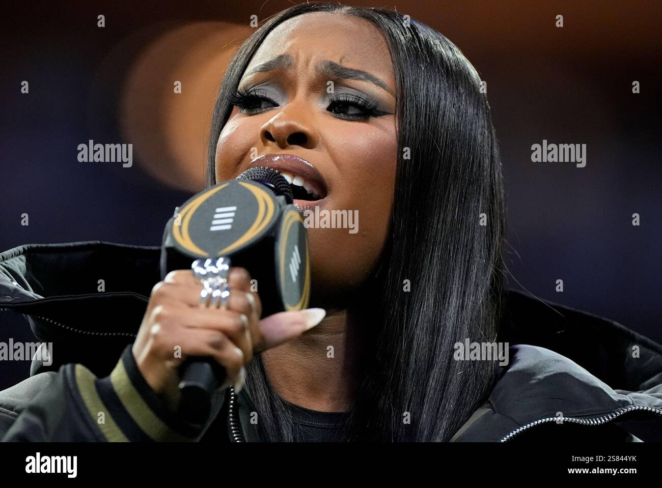 Coco Jones performs the national anthem before the College Football ...