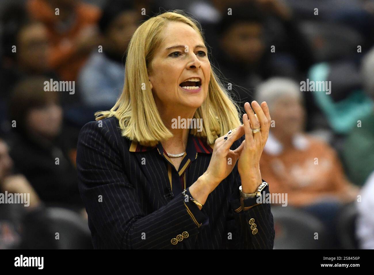 Maryland head coach Brenda Frese claps during the first half of an NCAA ...