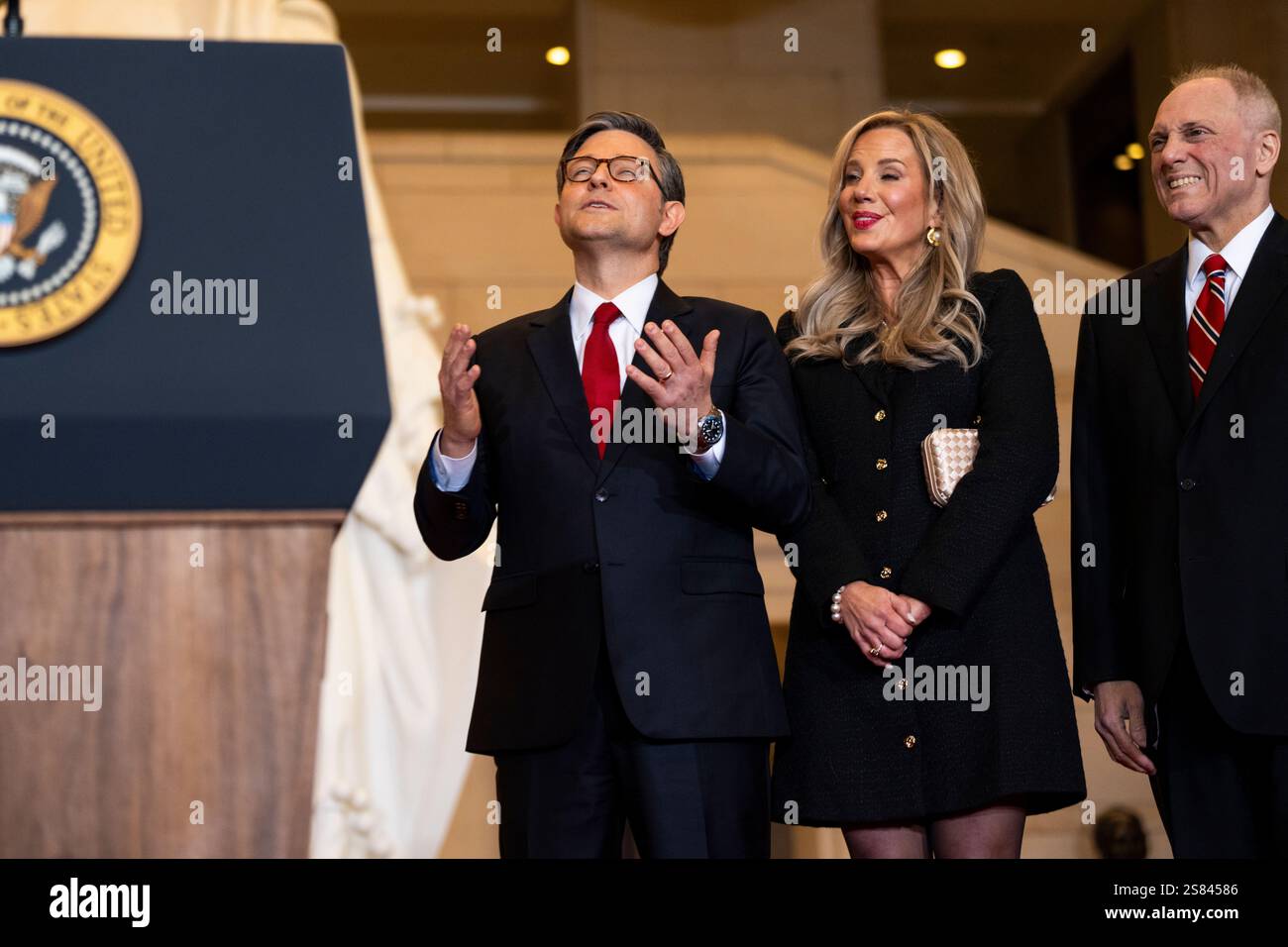 President Donald Trump addresses guests and supporters in an overflow ...