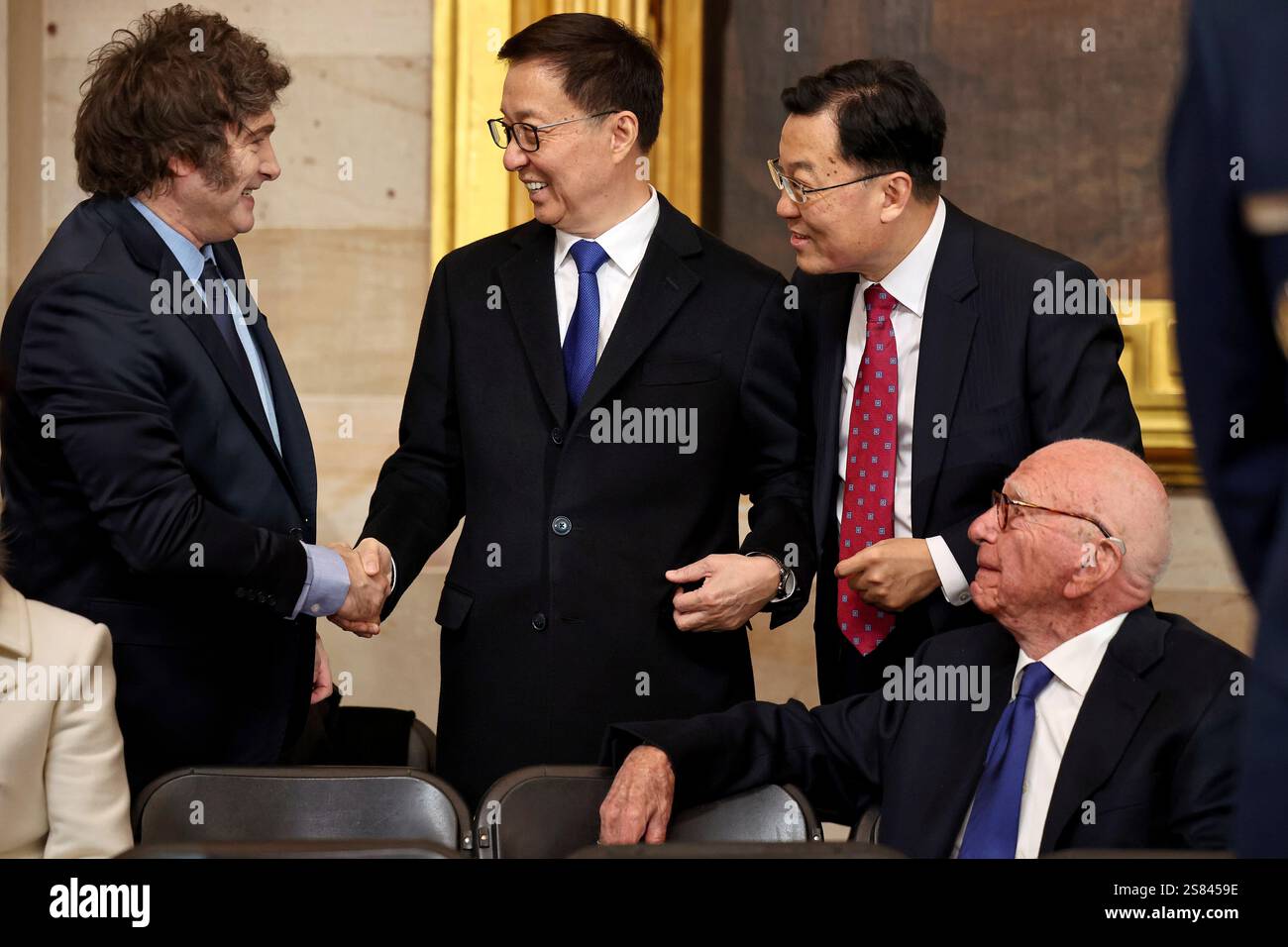 Argentina's President Javier Milei, left, greets China's Vice President ...