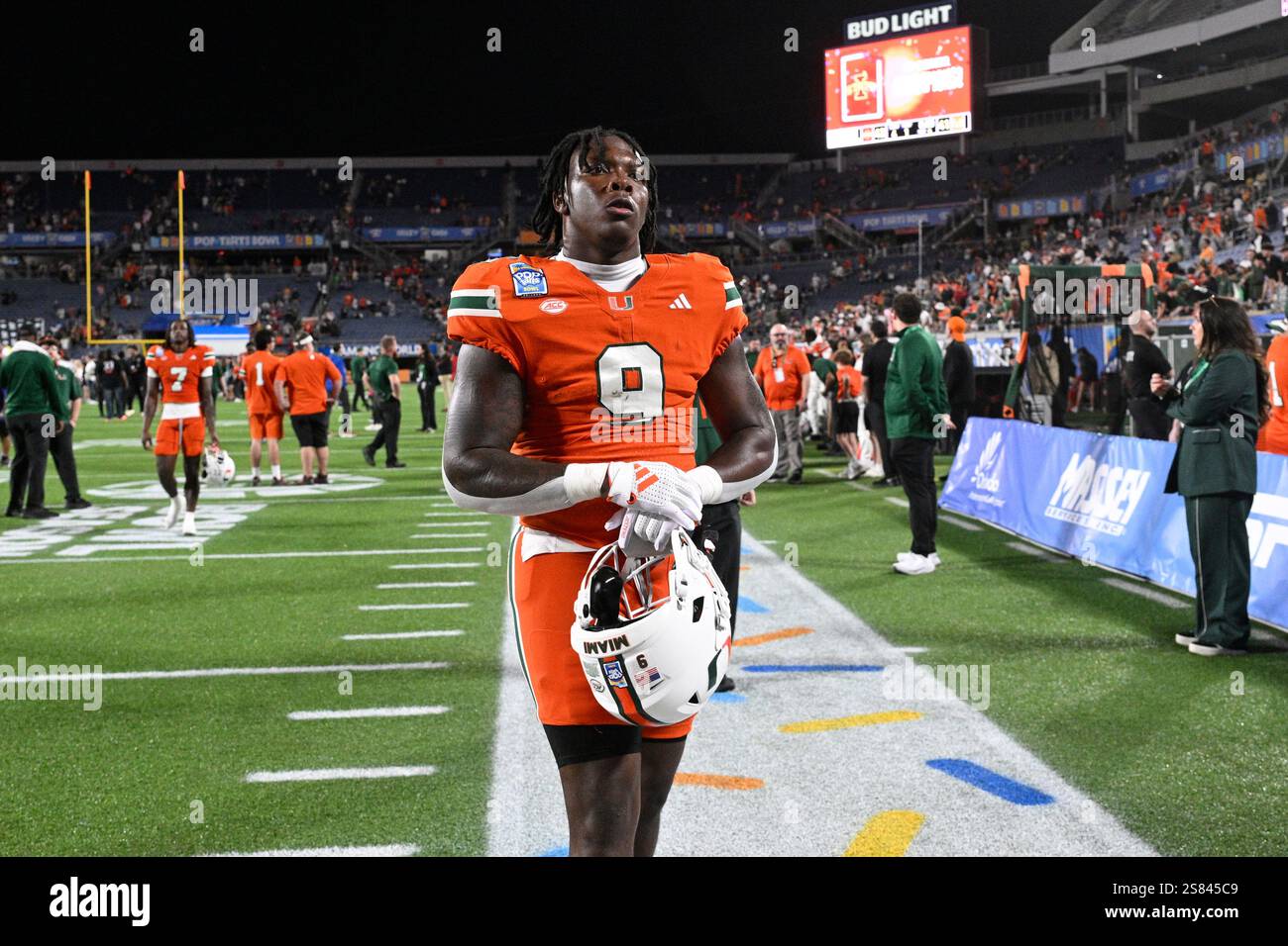Miami tight end Elija Lofton (9) leaves the field after a loss to Iowa ...