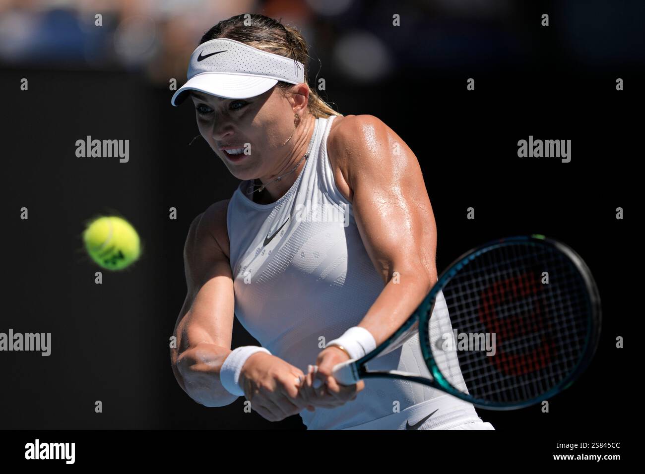 Paula Badosa of Spain plays a backhand return to Coco Gauff of the U.S ...