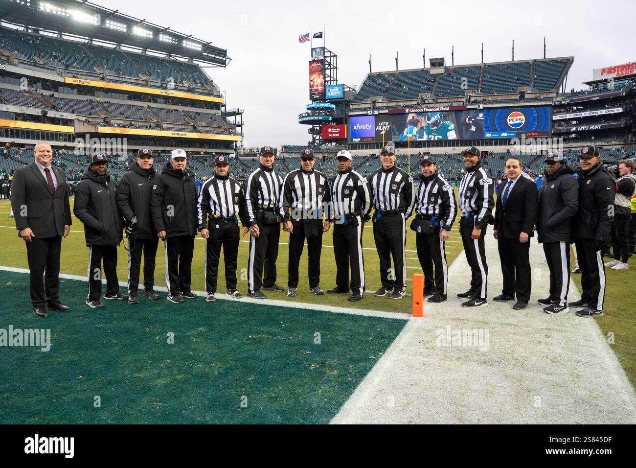 The officials: (left to right), assistant replay official Brian Daves ...