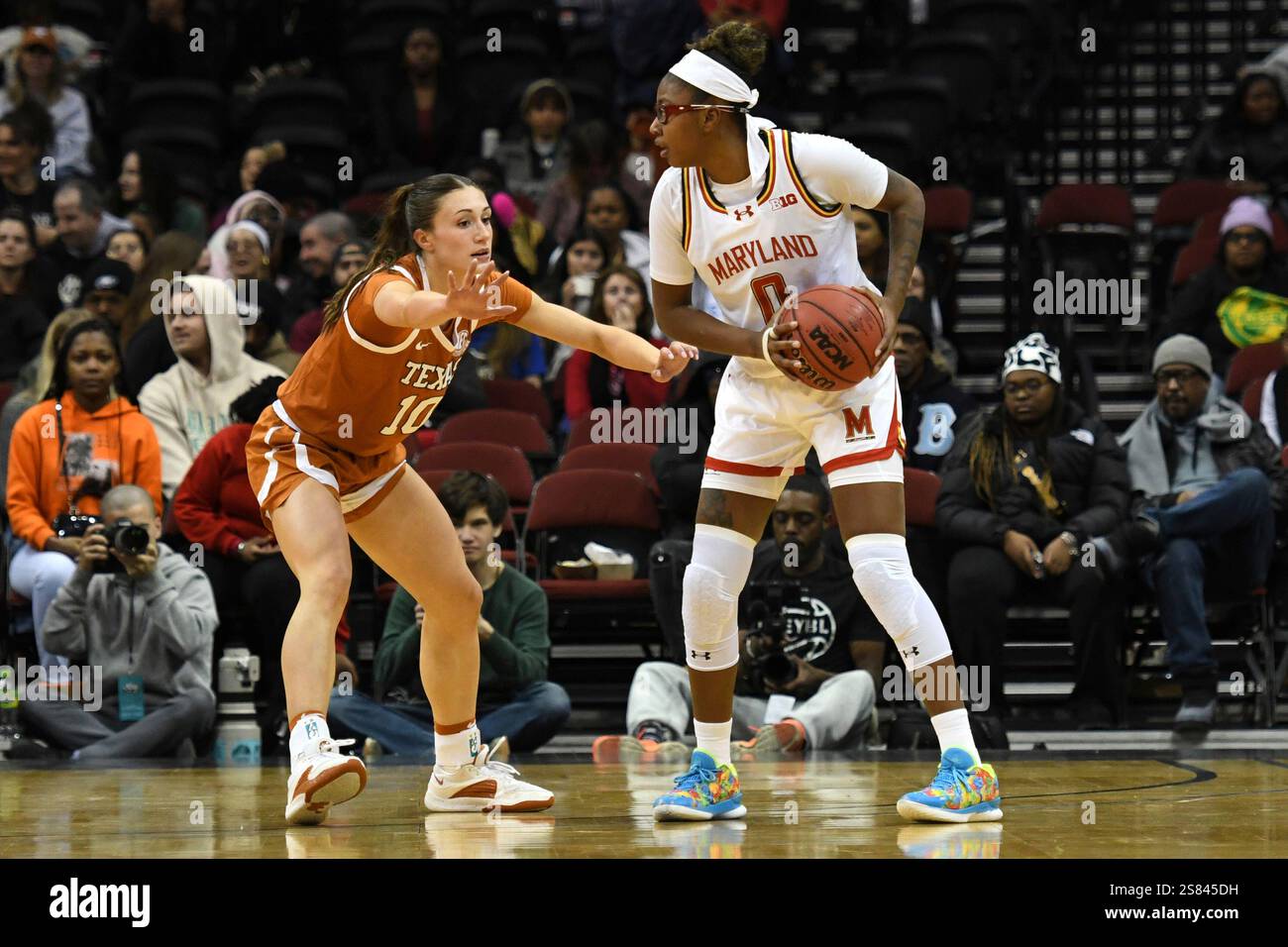Maryland guard Shyanne Sellers, right, looks to pass the ball against ...