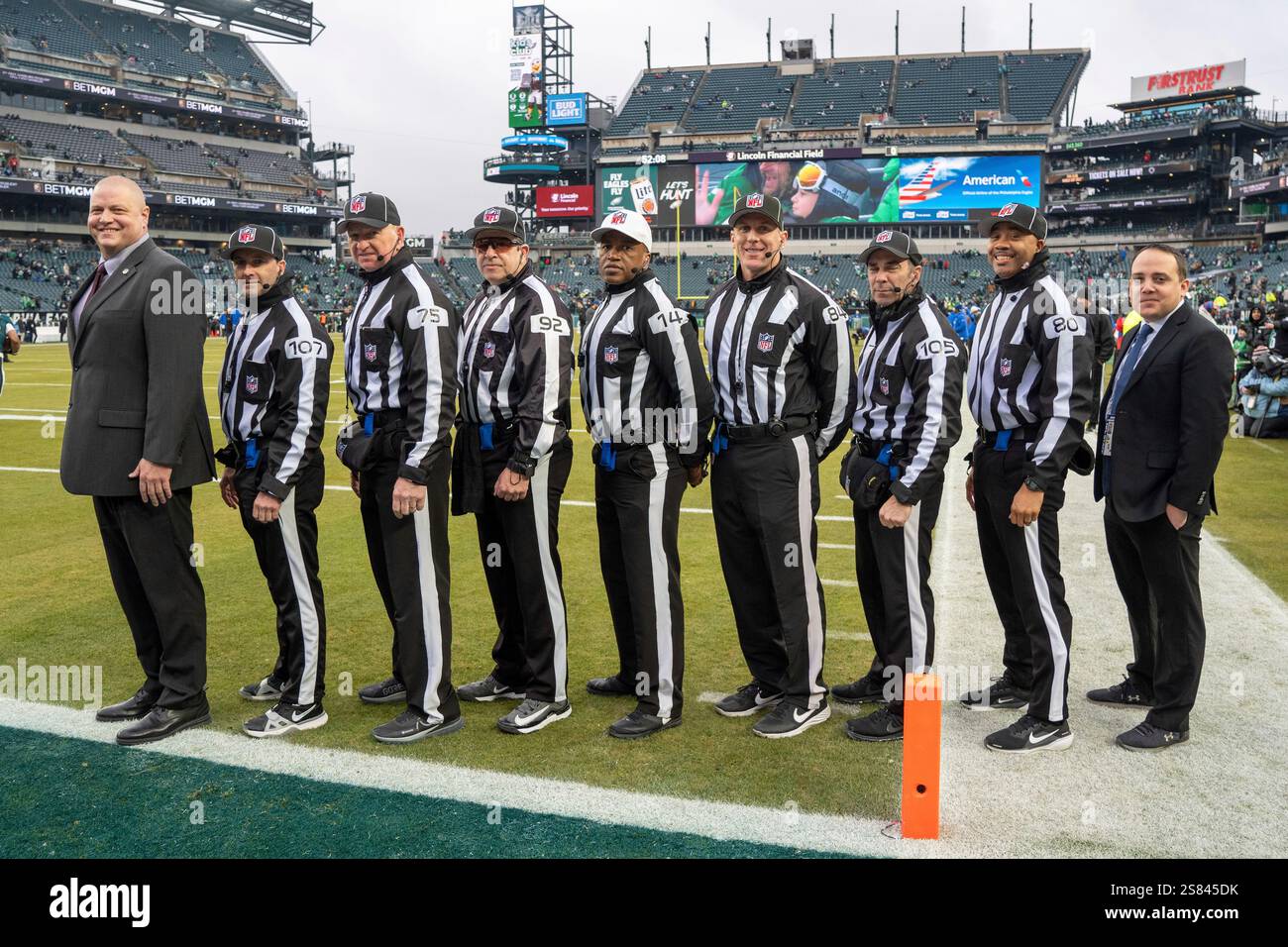 The officials: (left to right), assistant replay official Brian Daves ...