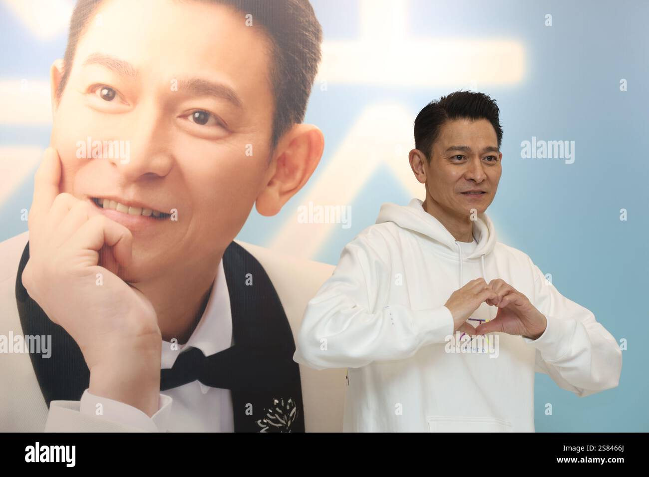 Hong Kong superstar Andy Lau gestures at a press conference before his concert tour on January ...