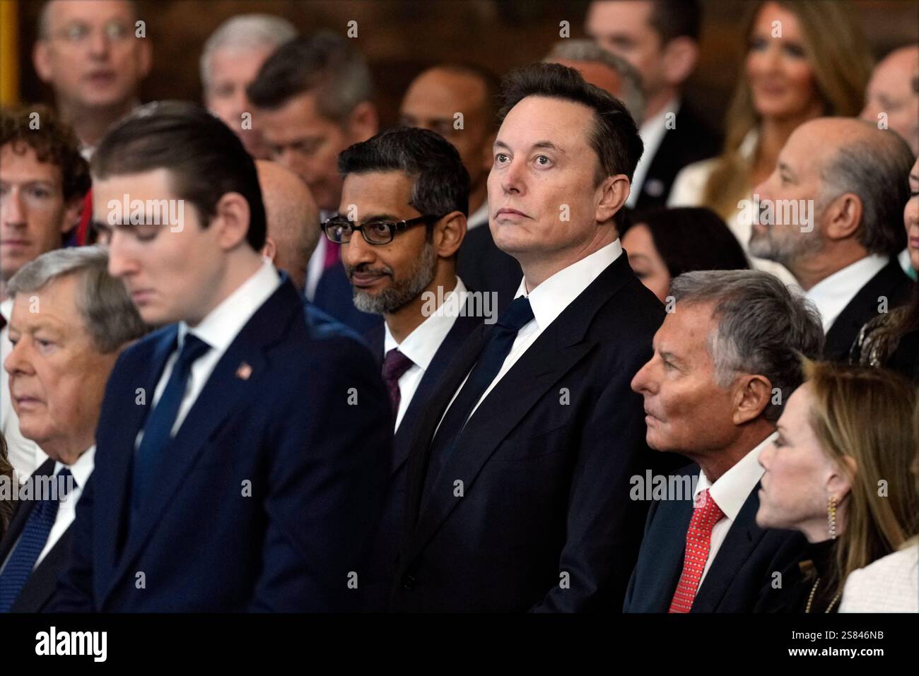 Google CEO Sundar Pichai and Elon Musk watch during the 60th ...