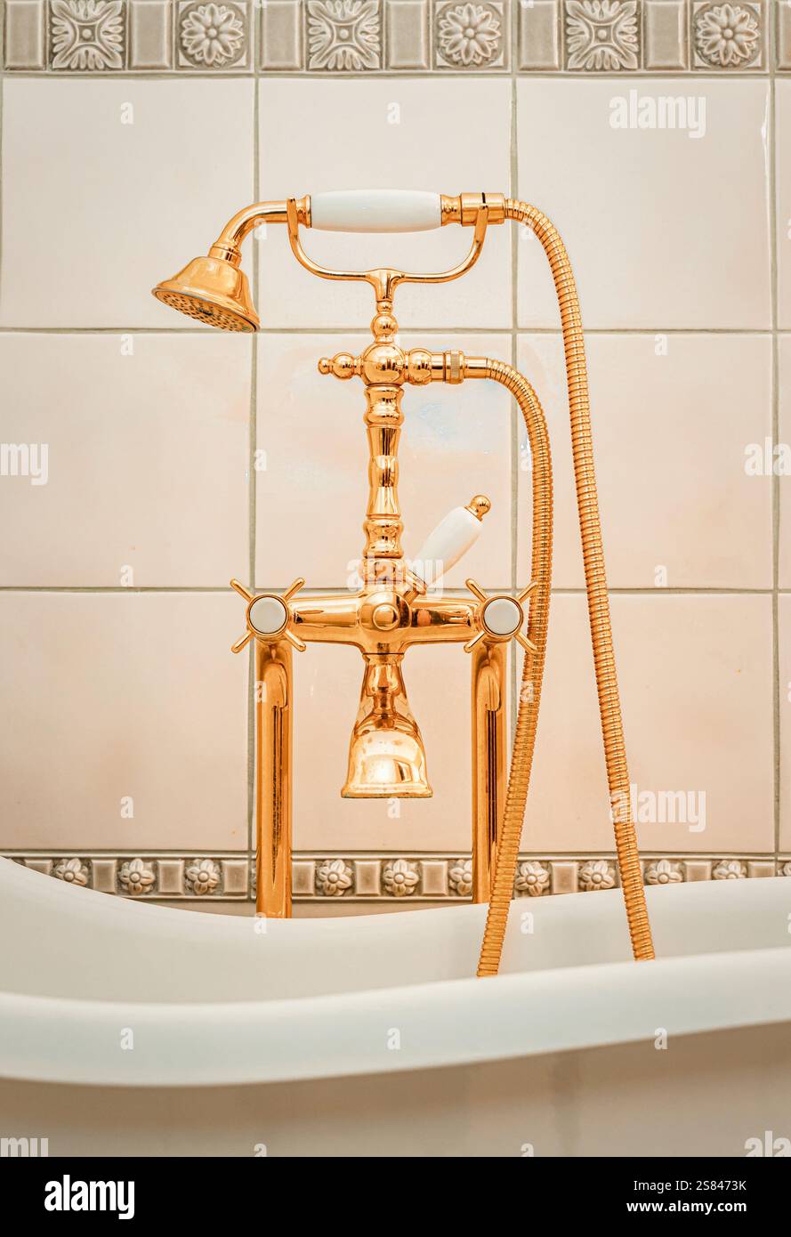 Vintage style gold faucet with white ceramic handles and handheld ...