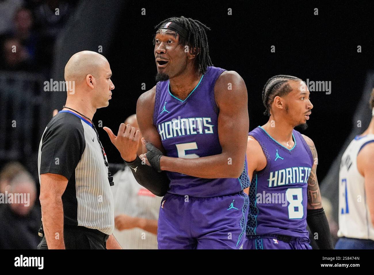 Charlotte Hornets center Mark Williams (5) reacts to a foul call during ...