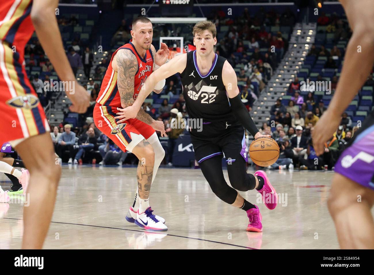 Utah Jazz forward Kyle Filipowski (22) tries to drive past New Orleans ...