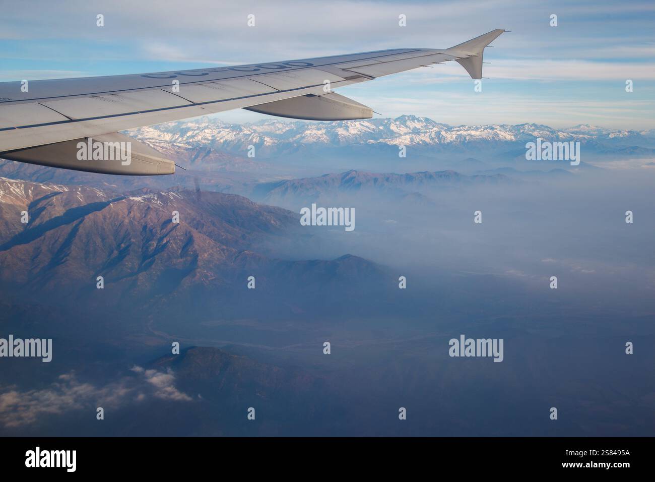 The Snowcaped Andes Mountains from the airplane window, Chile Stock ...