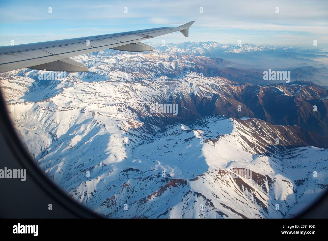 The Snowcaped Andes Mountains from the airplane window, Chile Stock ...