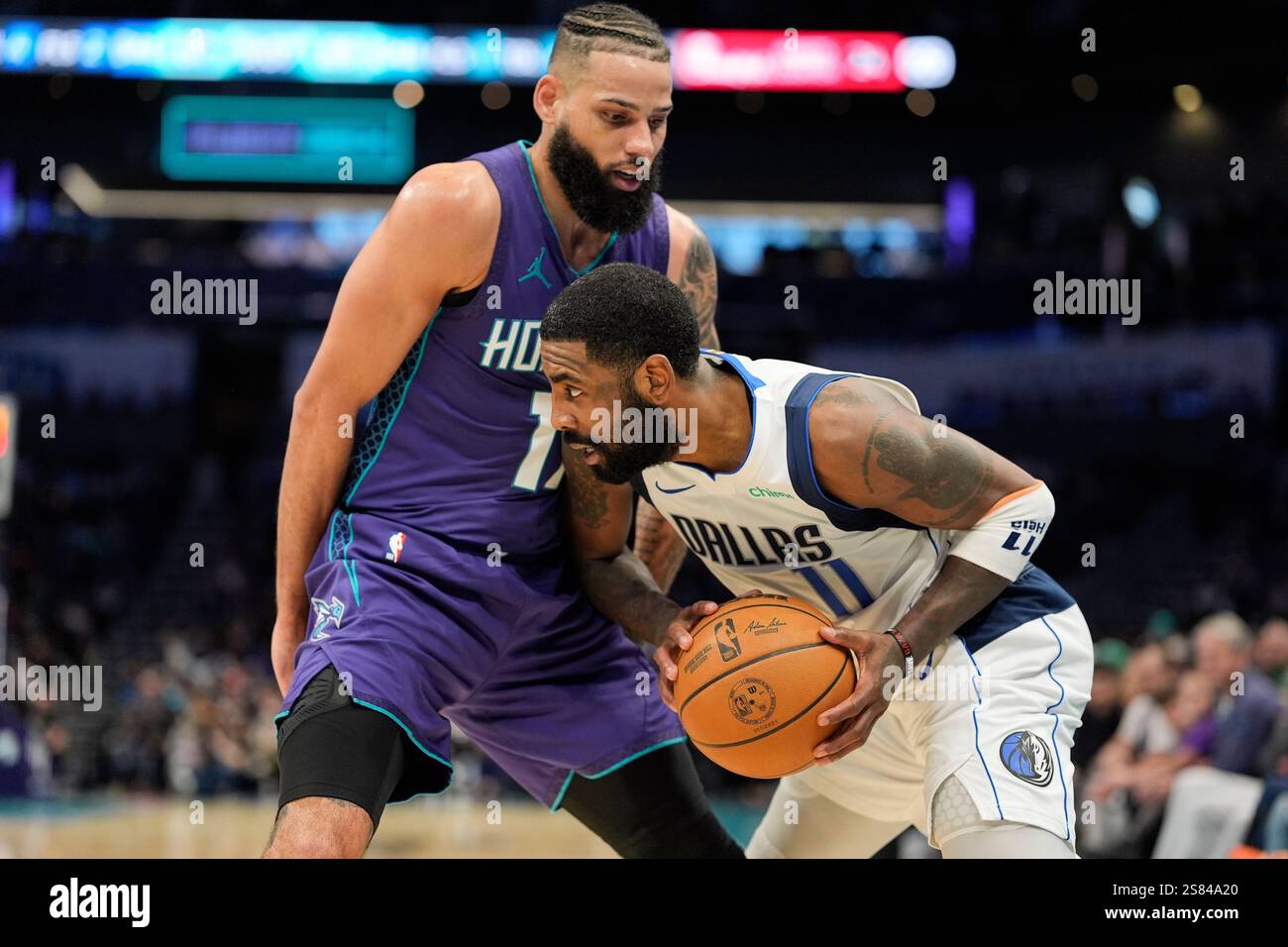Charlotte Hornets forward Cody Martin (11) guards Dallas Mavericks ...