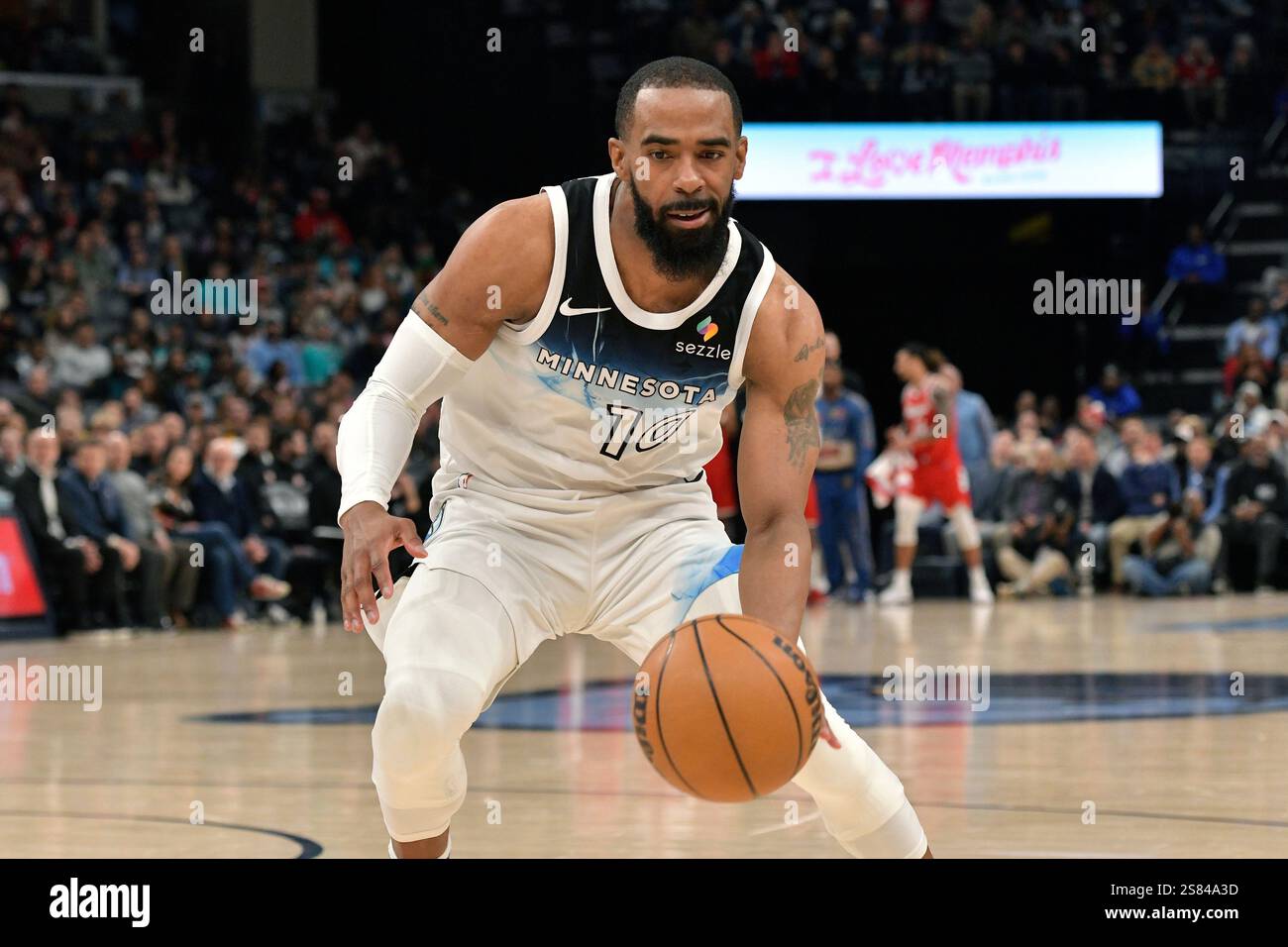 Minnesota Timberwolves guard Mike Conley (10) handles the ball in the ...