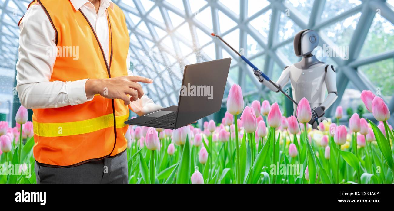 Engineer work with assistant robotic gardener in smart indoor tulip ...