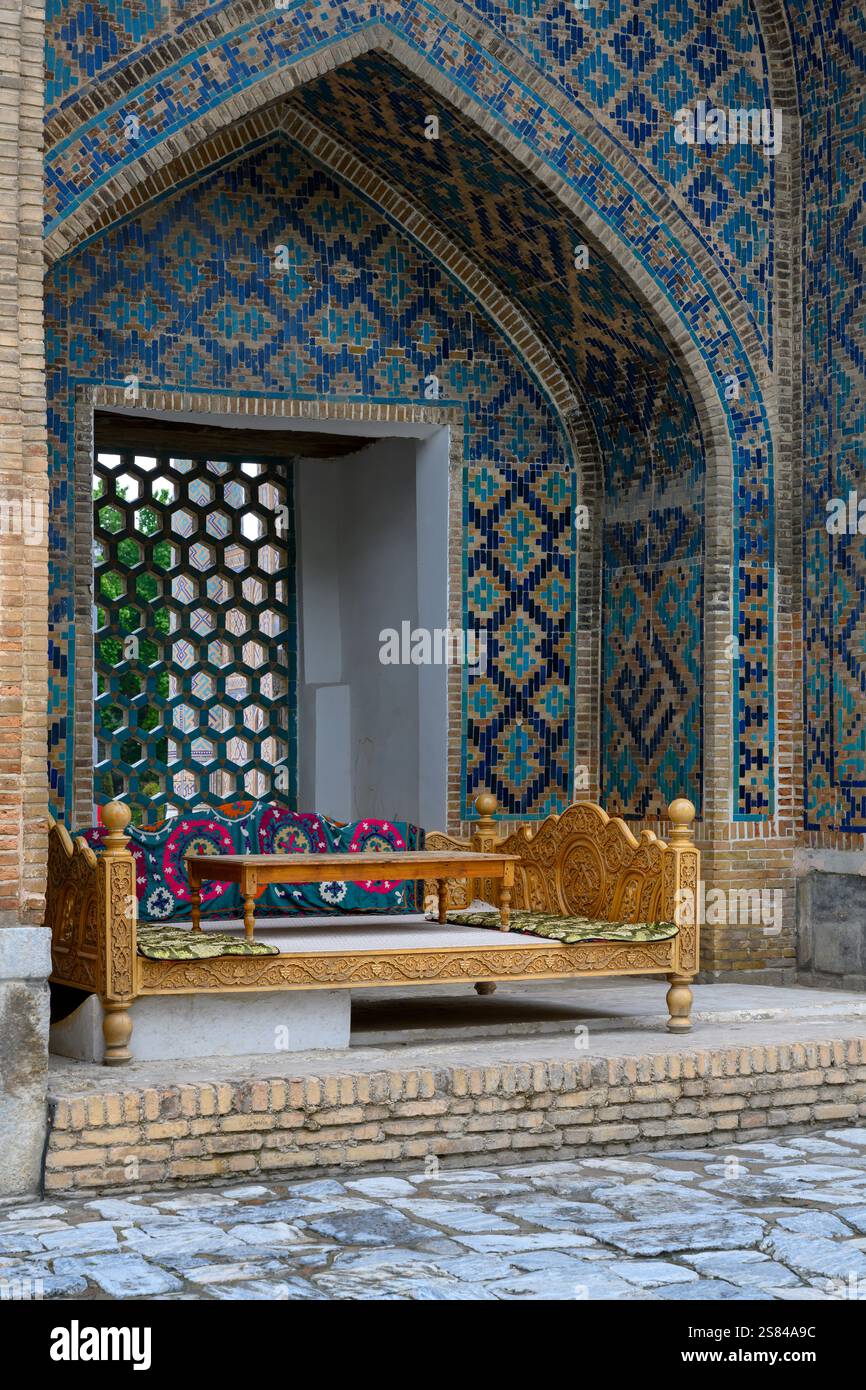 Traditional Central Asian carved wooden cot in the Tillya-Kori Madrasah ...