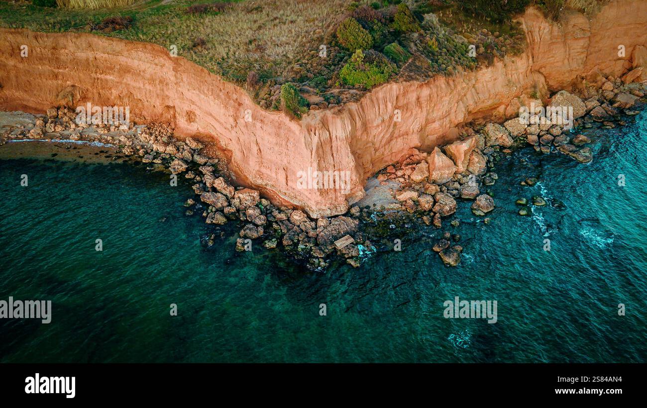 Clear blue water lapping rugged hi-res stock photography and images - Alamy