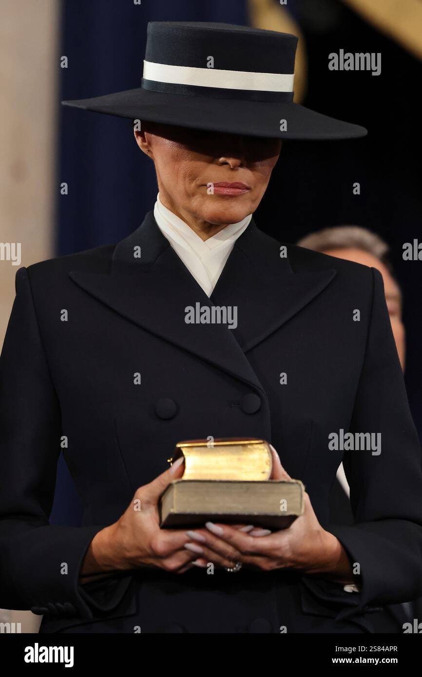 WASHINGTON, DC - JANUARY 20: First lady Melania Trump holds two Bibles ...