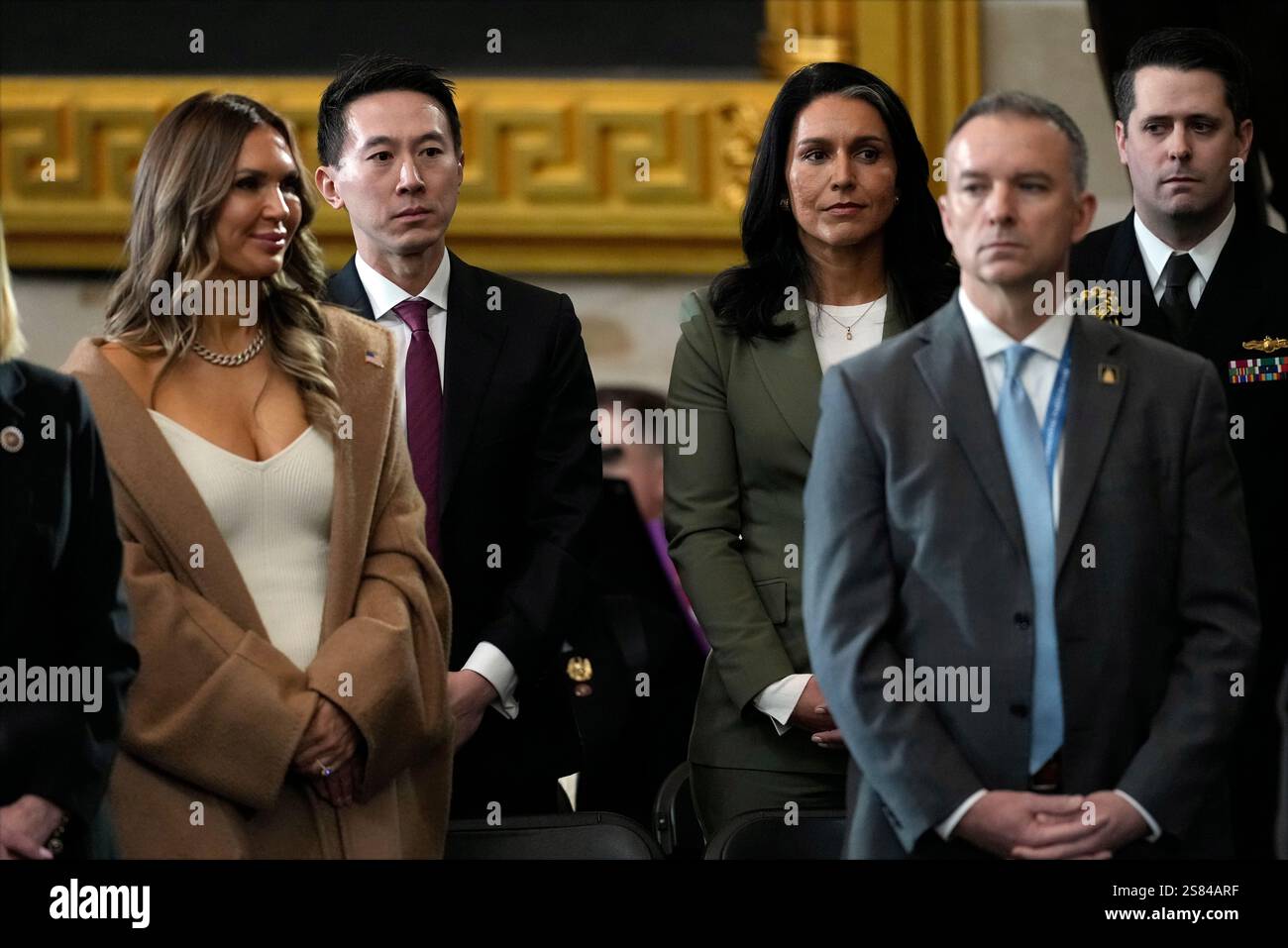 China s Vice President Han Zheng, second from left, stands with Tulsi ...