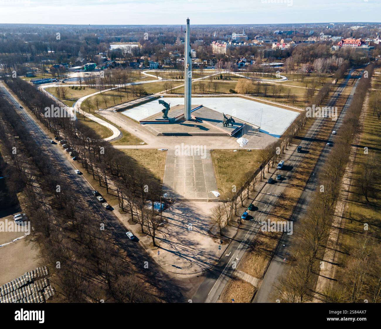 The Victory Monument in Riga features a tall obelisk, statues, and ...