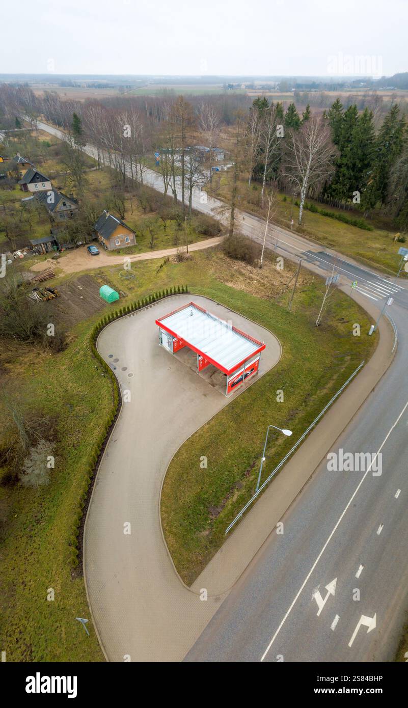 Aerial perspective of a gas station with a teardrop shaped driveway ...