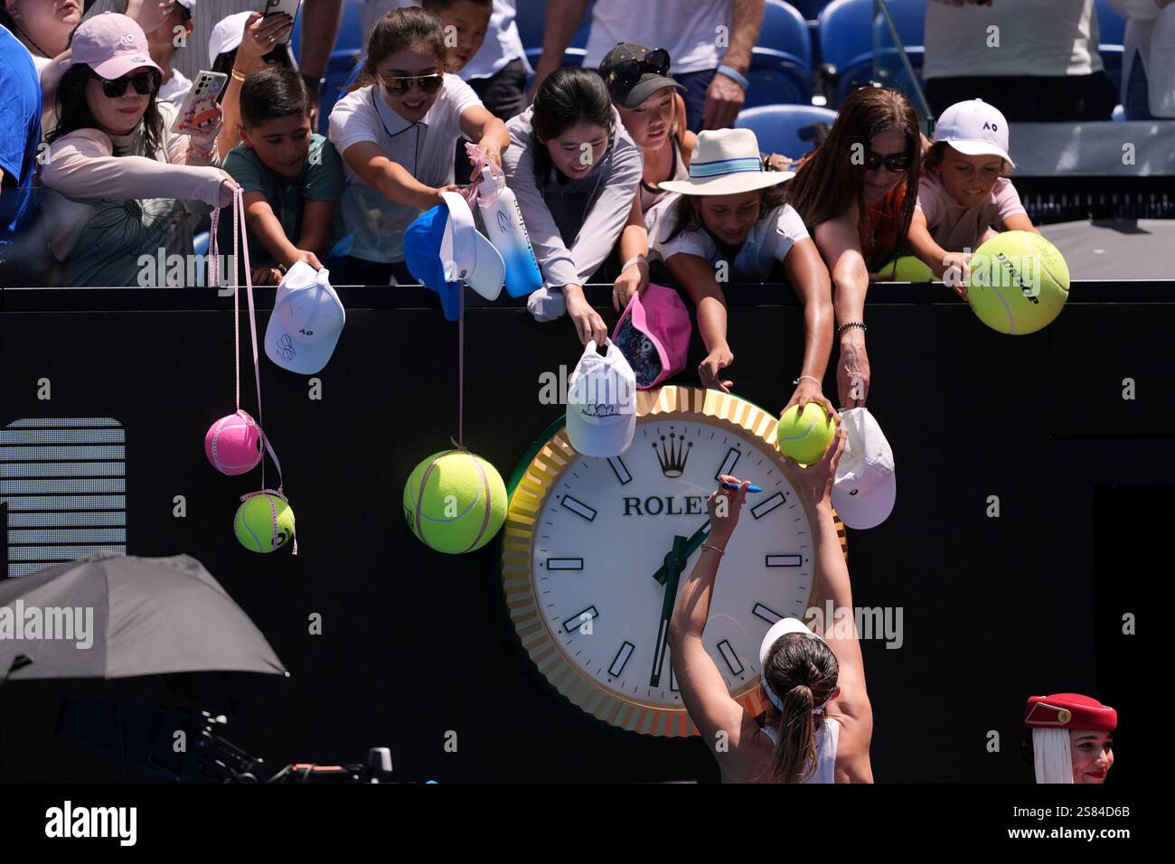 Paula Badosa of Spain signs autographs after defeating Coco Gauff of ...