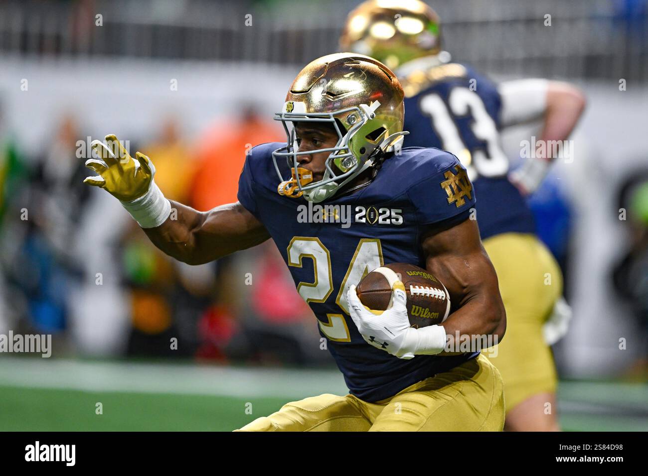 ATLANTA, GA – JANUARY 20: Running Back Jadarian Price #24 of the Notre Dame Fighting Irish runs ...