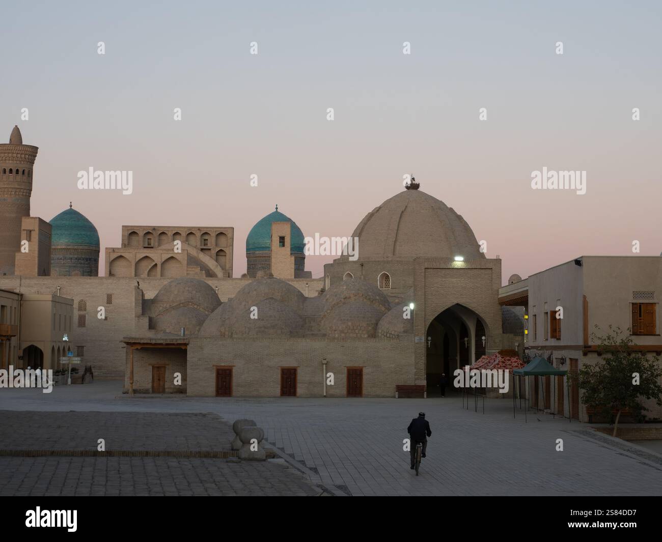Marketplace in Old City of Bukhara with domes and minaret of Kalan ...