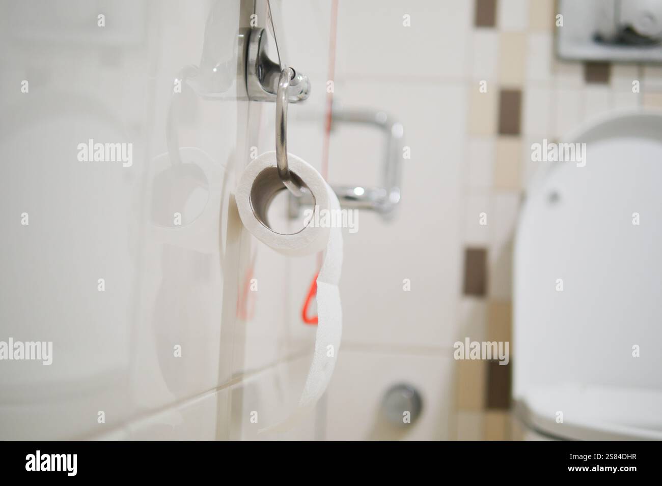 Tissue core on the hanger Stock Photo - Alamy