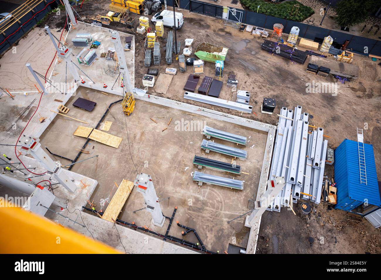 An aerial perspective of a construction site featuring a partially ...