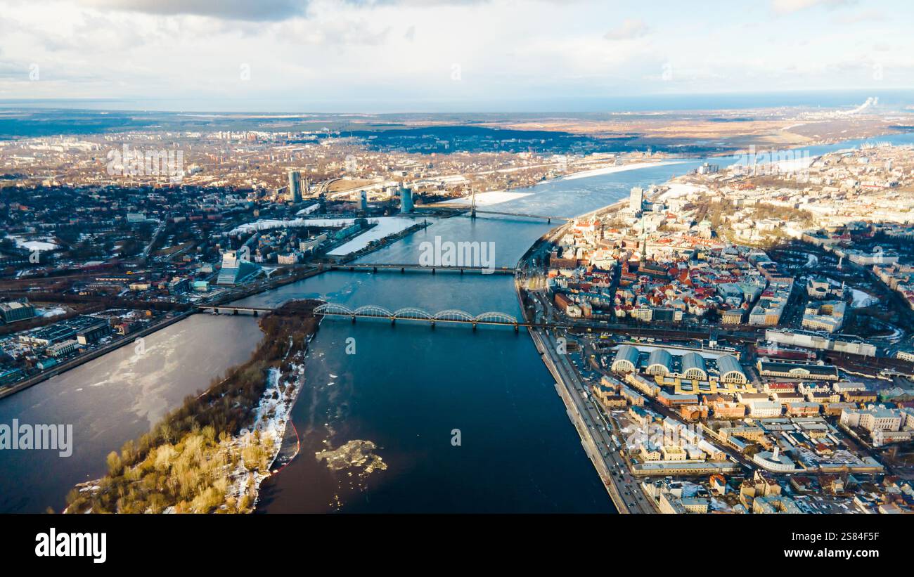 Aerial perspective of Riga, Latvia, featuring the Daugava River, the ...