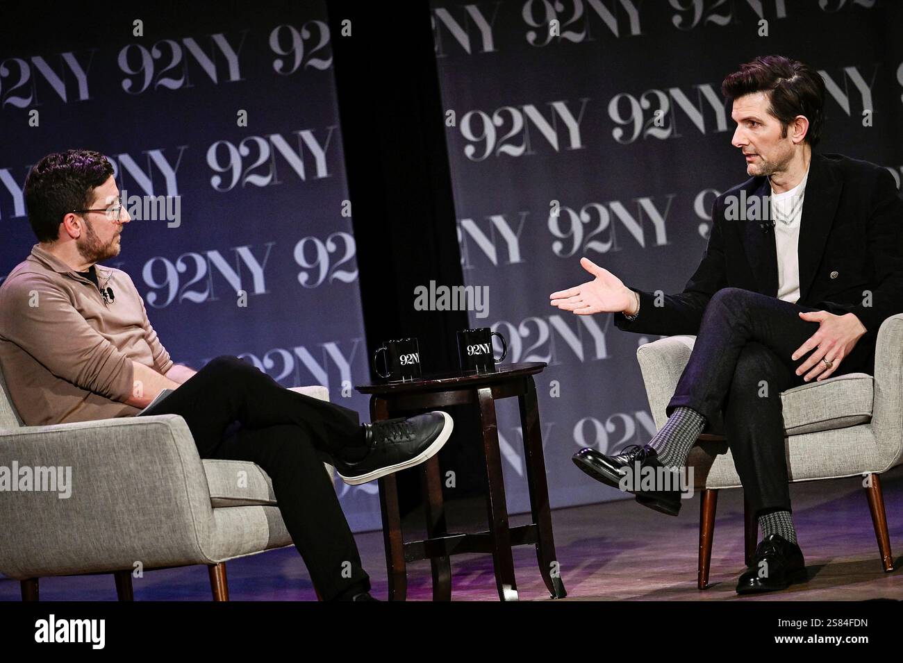 Actor Adam Scott, right, and moderator Josh Horowitz discuss the Apple ...