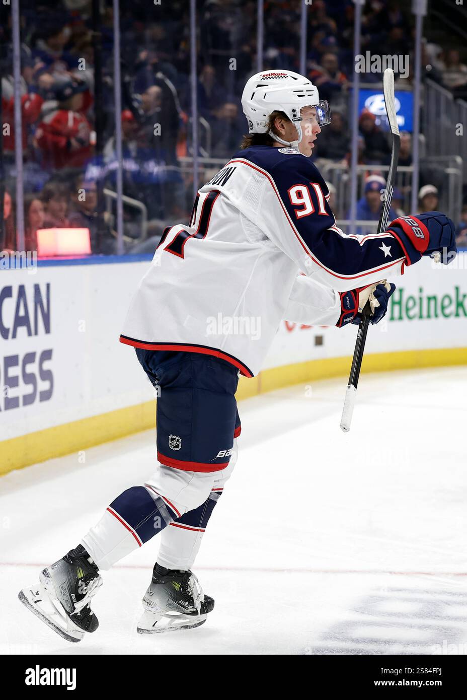 Columbus Blue Jackets center Kent Johnson (91) reacts after scoring a ...