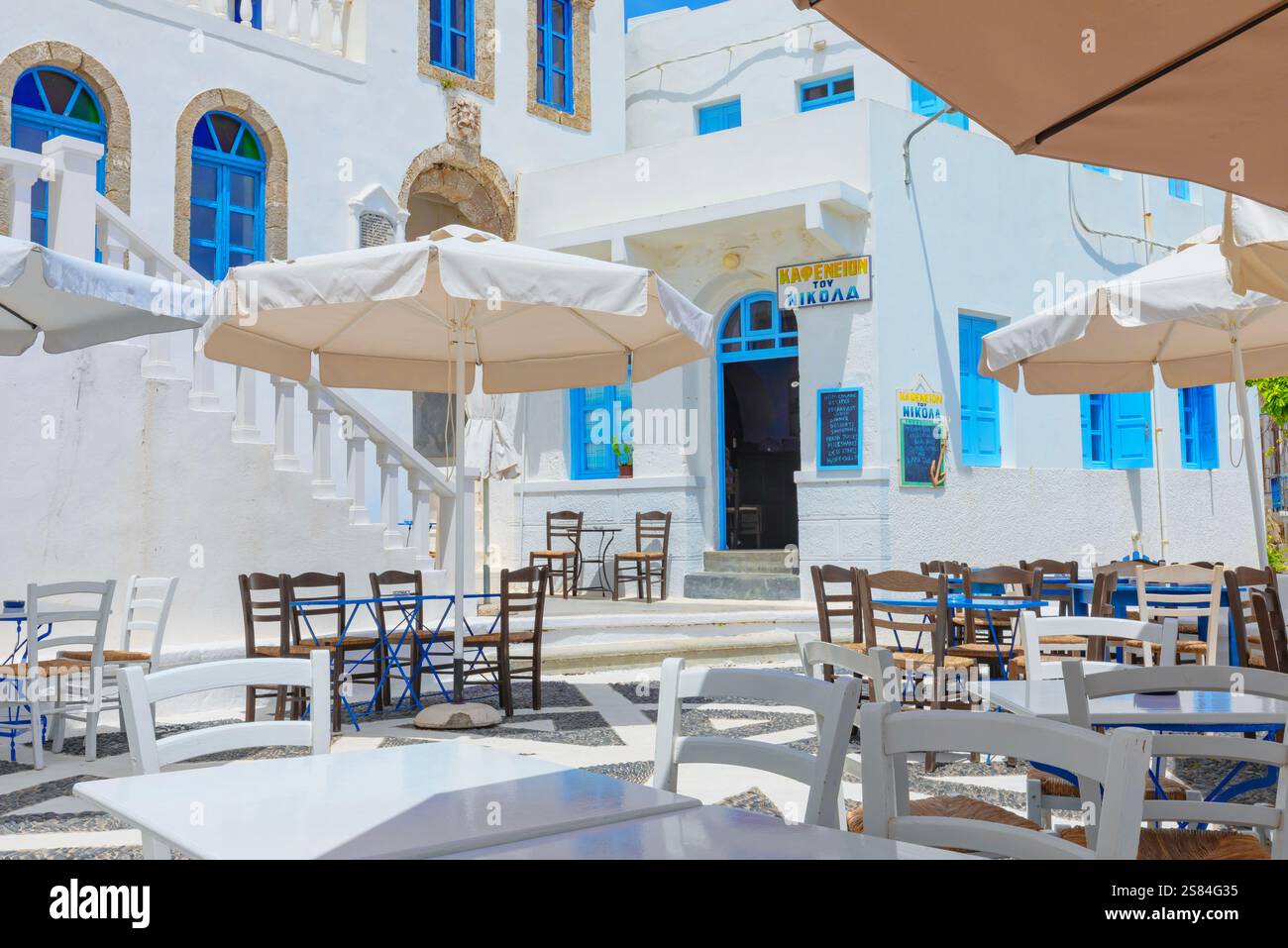 The picturesque main square of Nikia village, Nikia, Nisyros Island ...