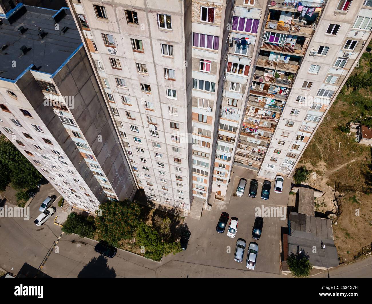 Cluster of tall, rectangular apartment buildings with balconies ...