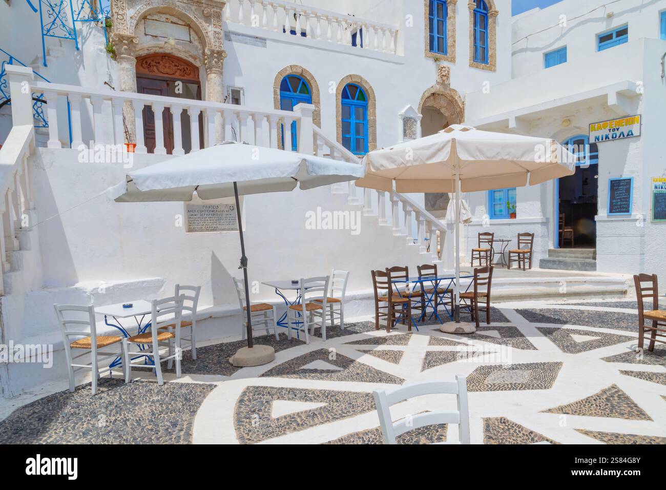 The picturesque main square of Nikia village, Nikia, Nisyros Island ...