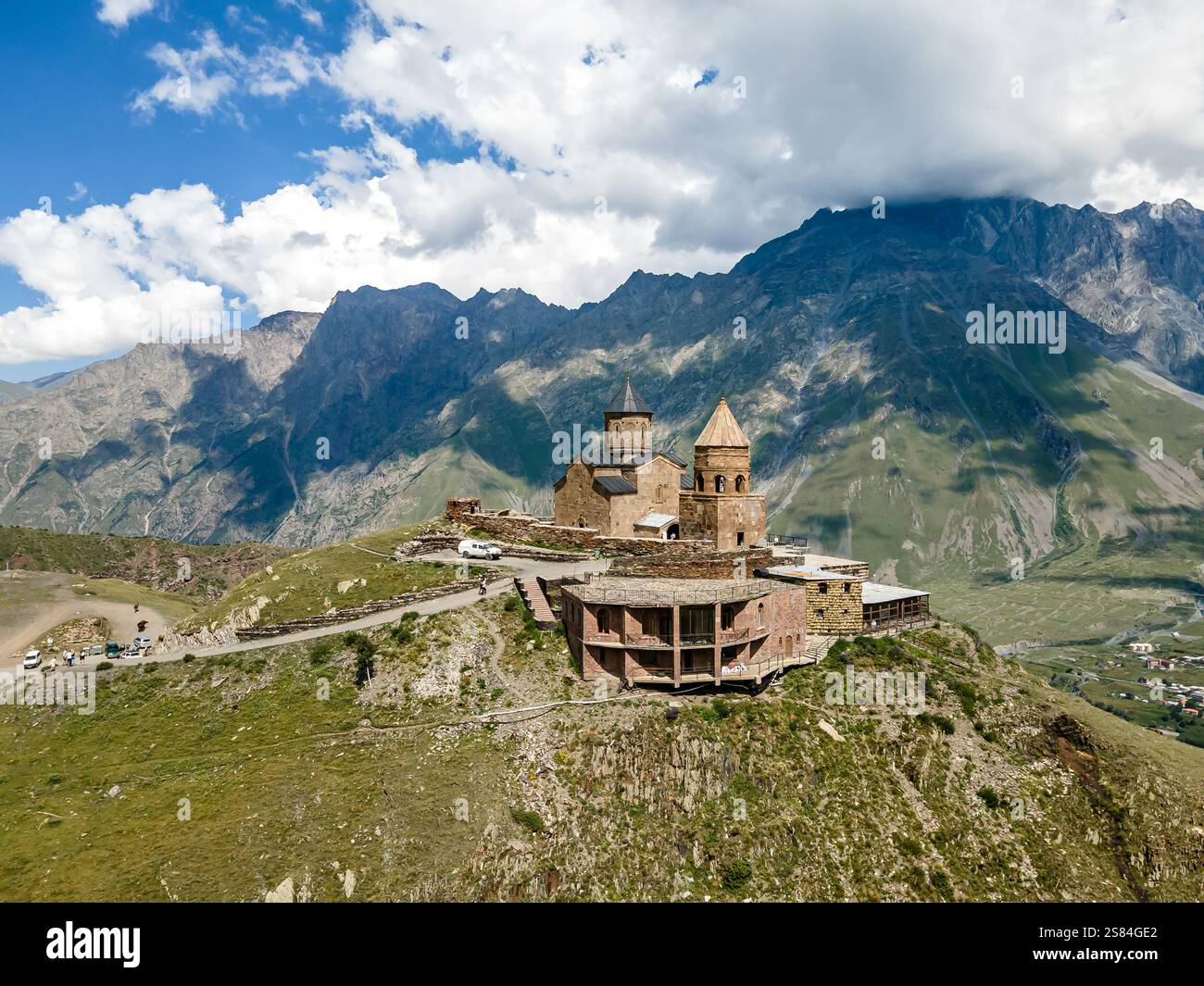 Gergeti Trinity Church sits on a hilltop near Stepantsminda, Georgia ...