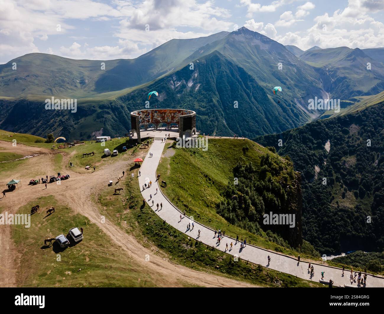 The Friendship Monument in Gudauri, Georgia, stands on a cliff with ...