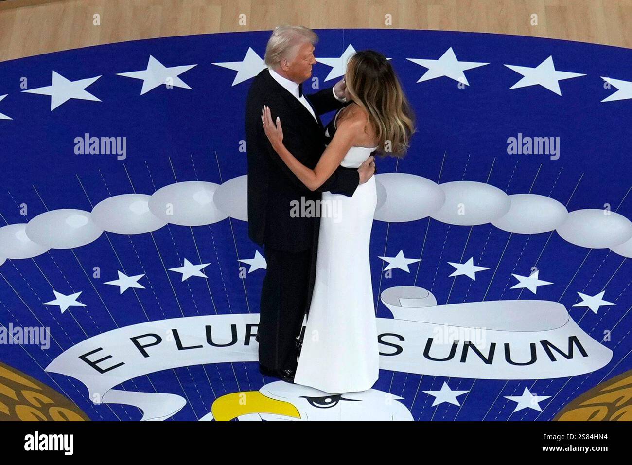 President Donald Trump, left, and first lady Melania Trump dance at the Commander in Chief Ball ...