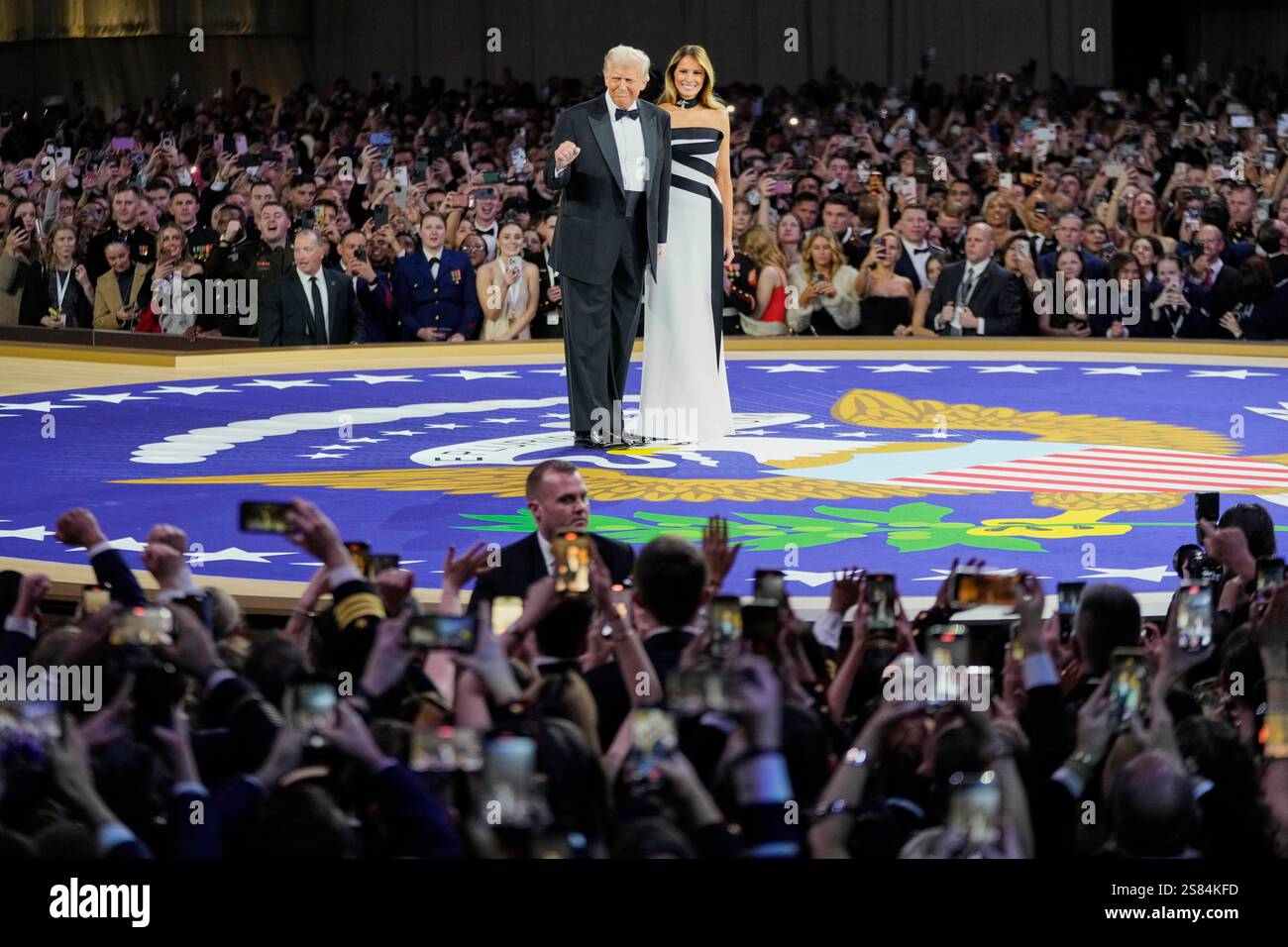 President Donald Trump and first lady Melania Trump on stage at the ...