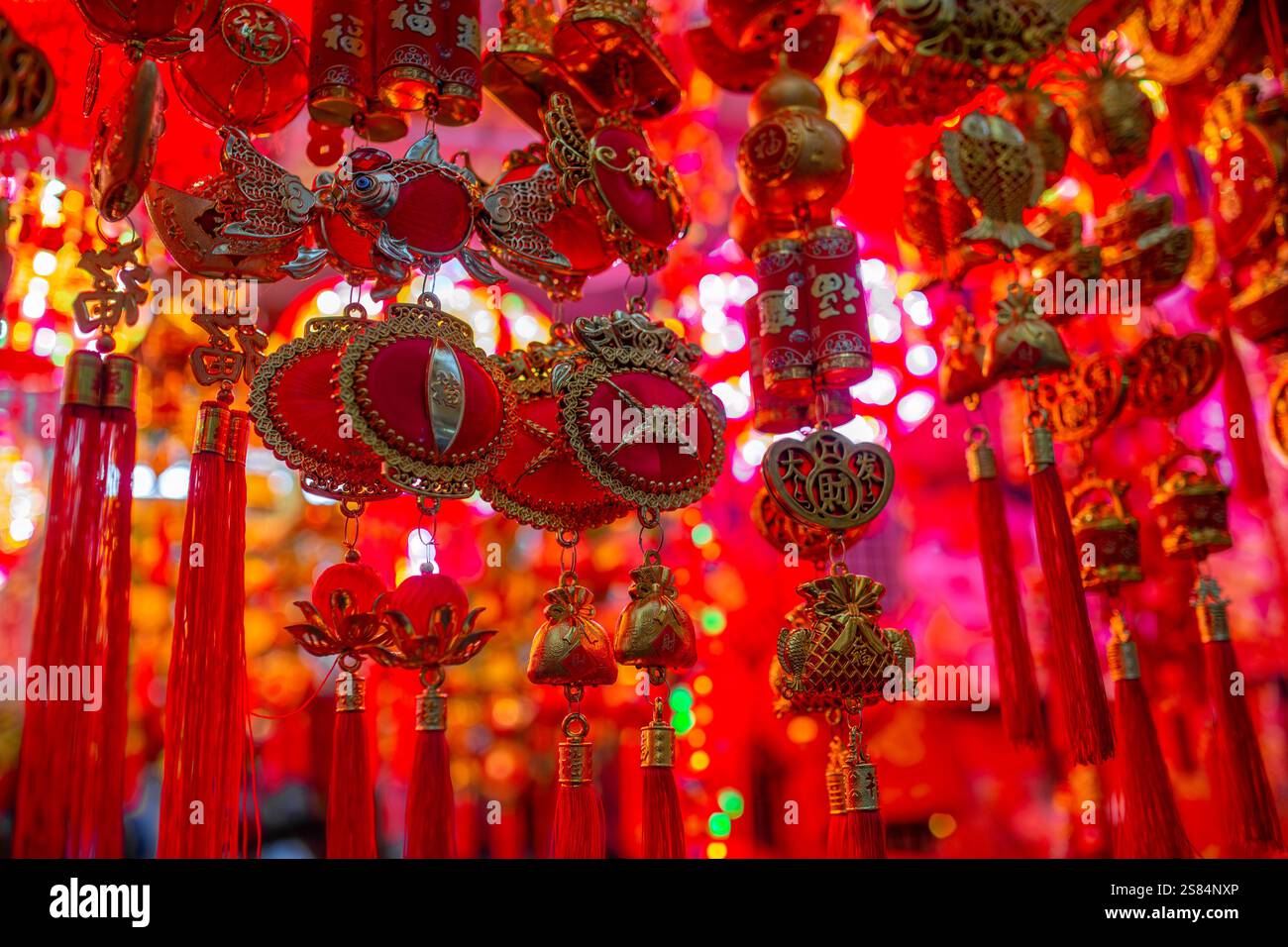 Lucky charms of the Chinese New Year for sale on display Stock Photo ...
