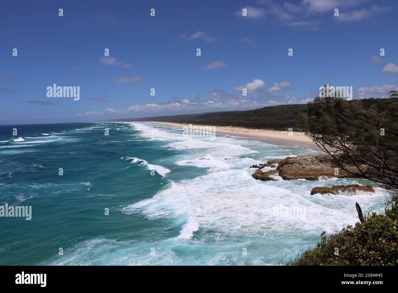 wide-angle panorama blue ocean, waves, white foam, golden sand beaches ...