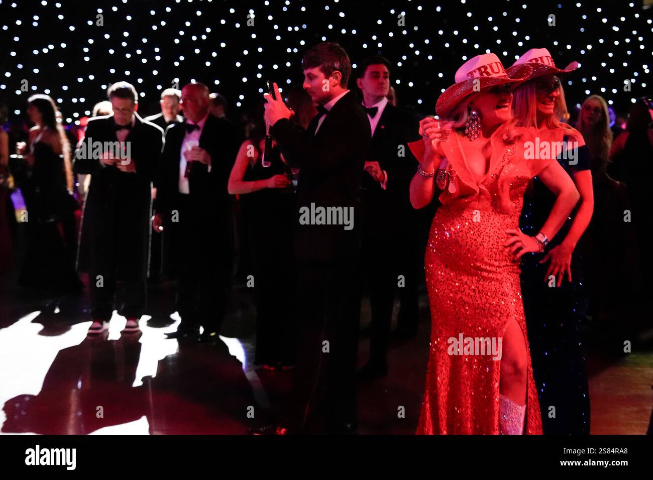 Guests mingle during the Liberty Ball during the 60th Presidential ...