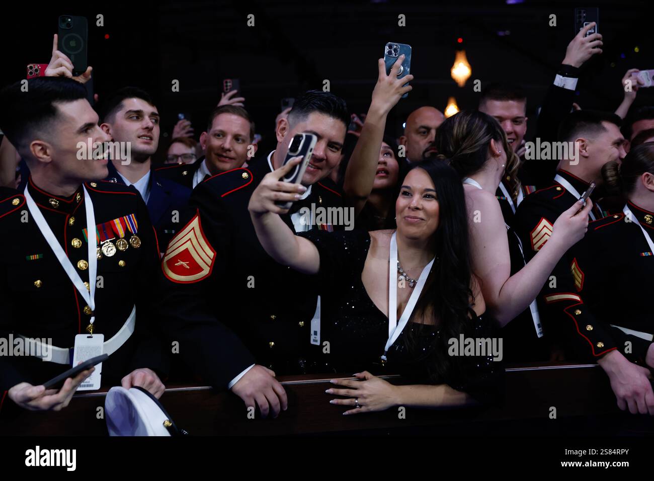 WASHINGTON, DC - JANUARY 20: Guests take pictures at the Commander-in ...