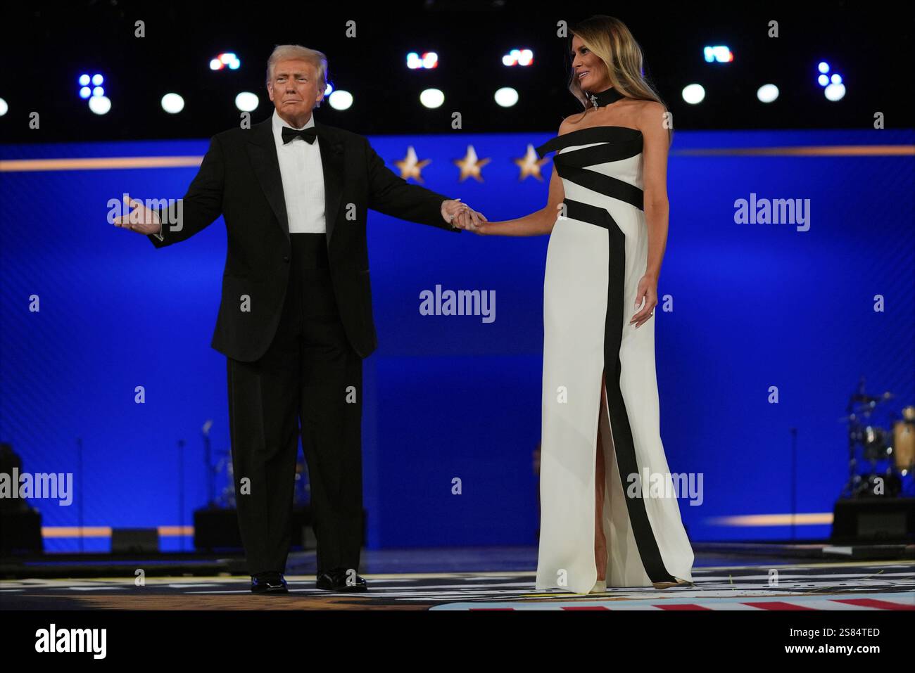 President Donald Trump and first lady Melania Trump dance at the ...