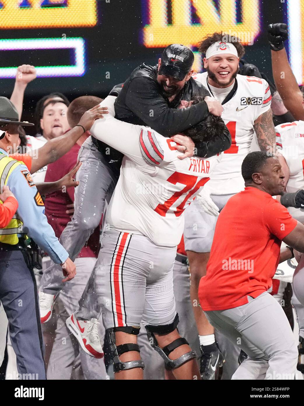 Atlanta, United States. 20th Jan, 2025. Players dump a bucket of ...