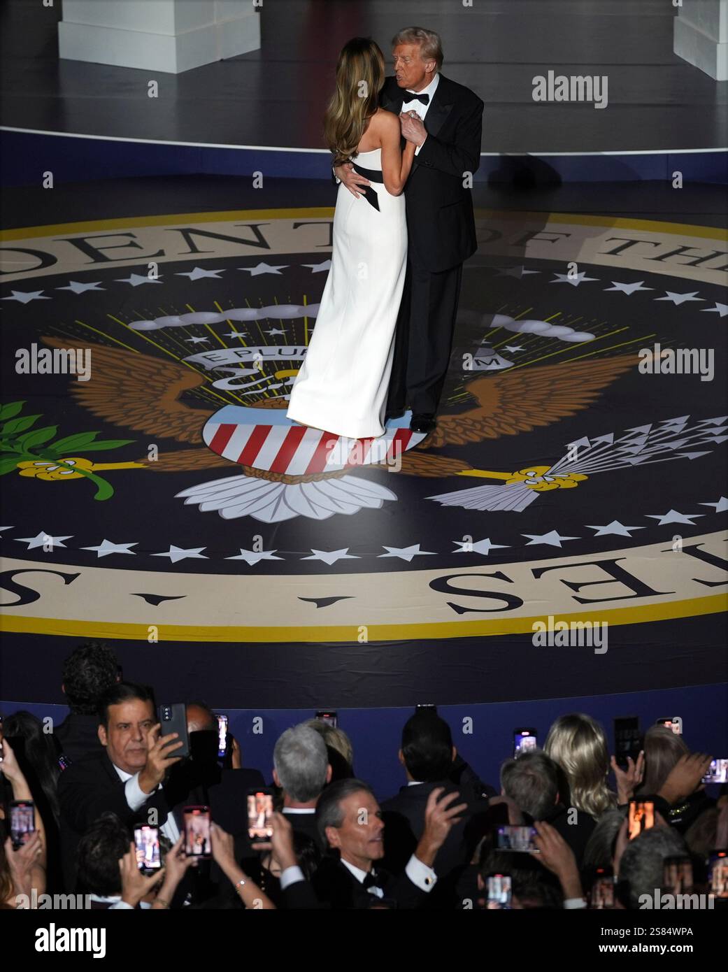 President Donald Trump and first lady Melania Trump dance at the ...