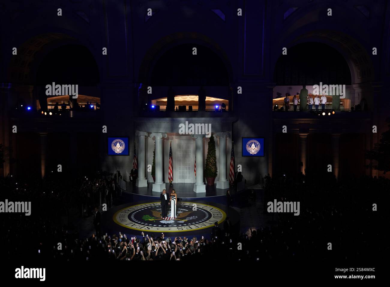 President Donald Trump and first lady Melania Trump dance at the ...
