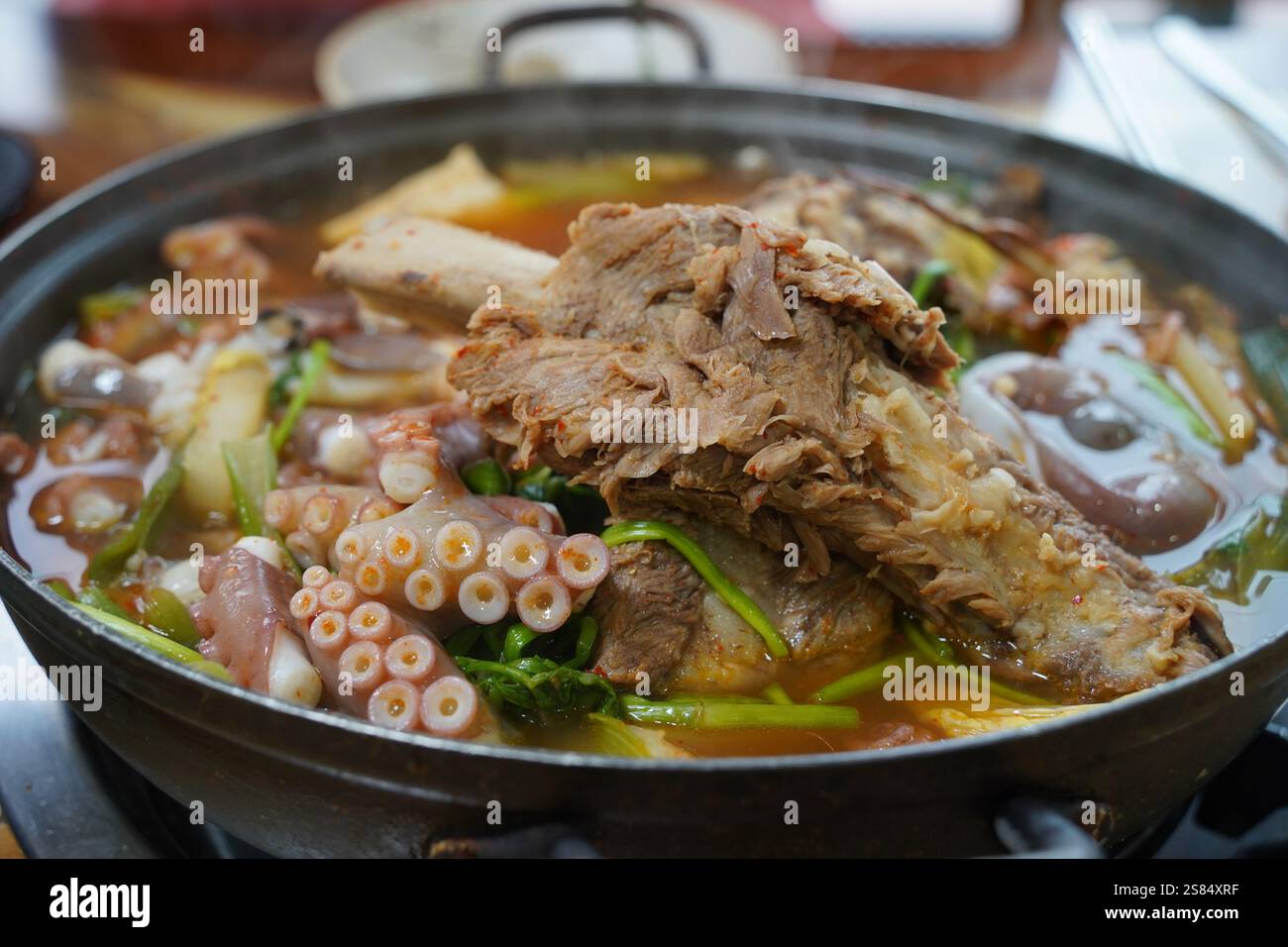 Korean health food made by boiling octopus and ribs together Stock ...